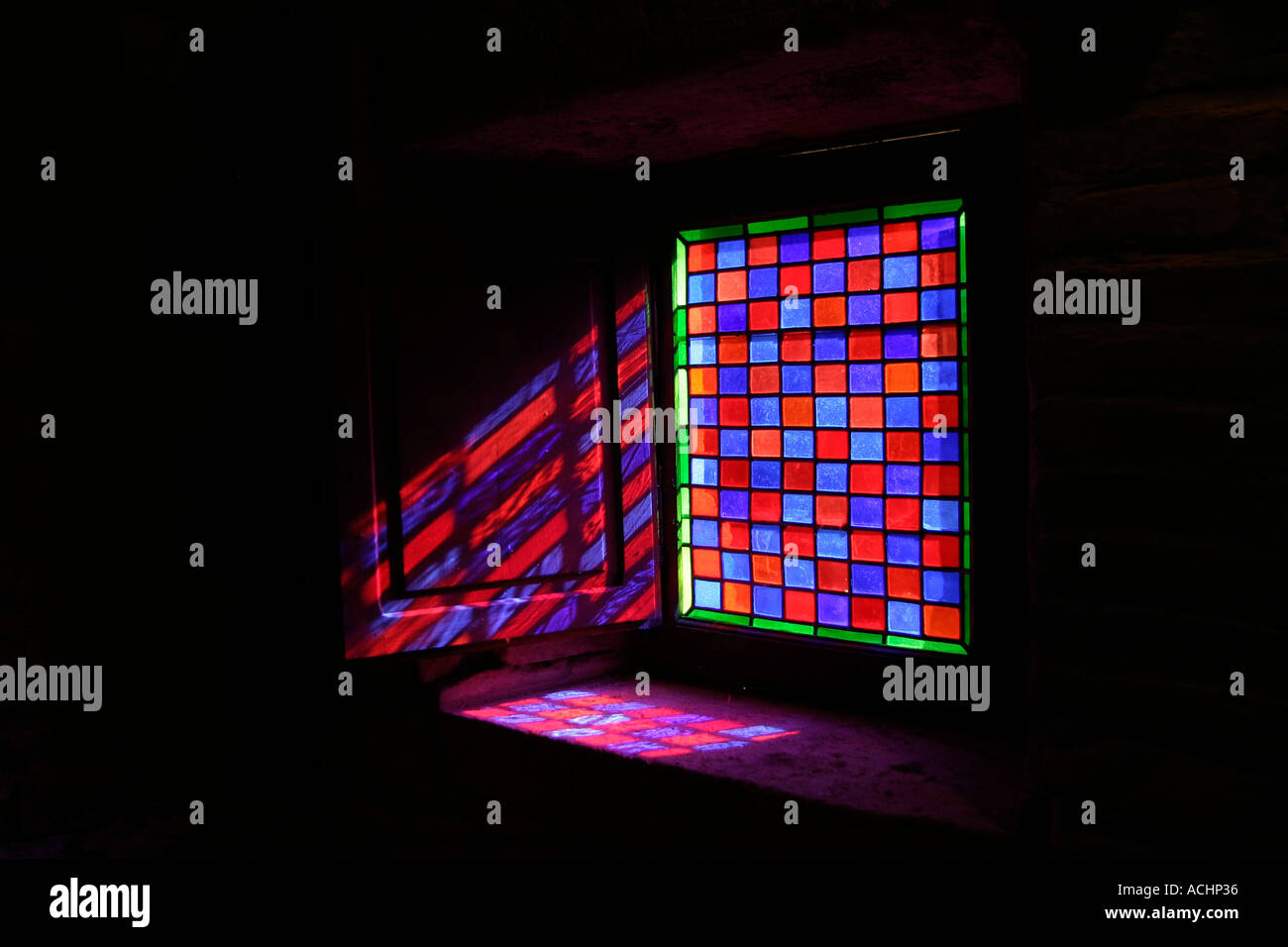 Traditional stained glass window in a medival french house in Burgundy ...