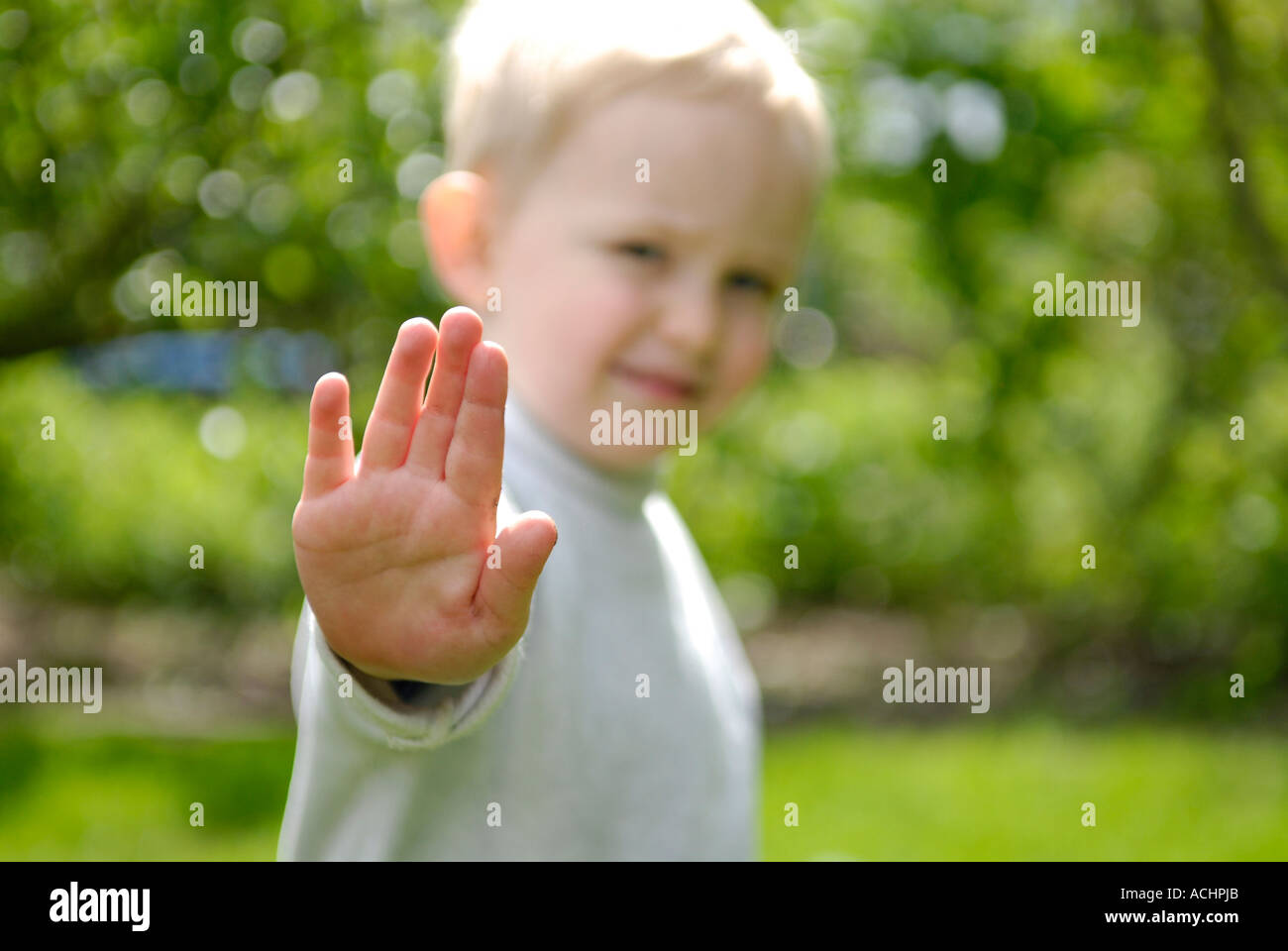 Child stretches hand Stock Photo - Alamy