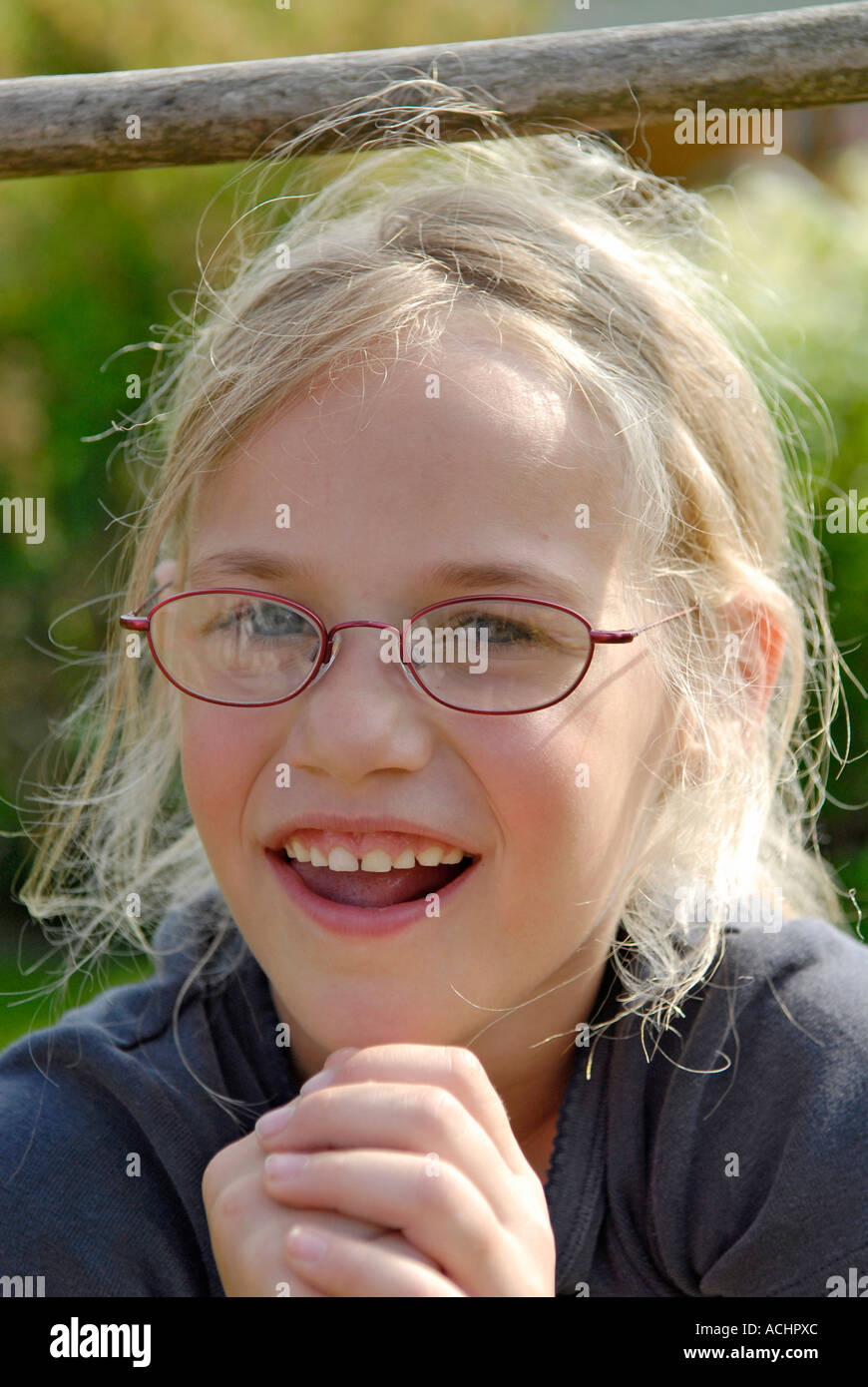 Girls blond sit hi-res stock photography and images - Alamy