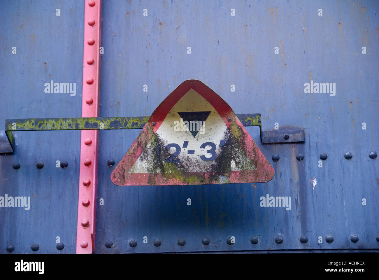 Damaged Bridge Height Restriction Warning Stock Photo - Alamy