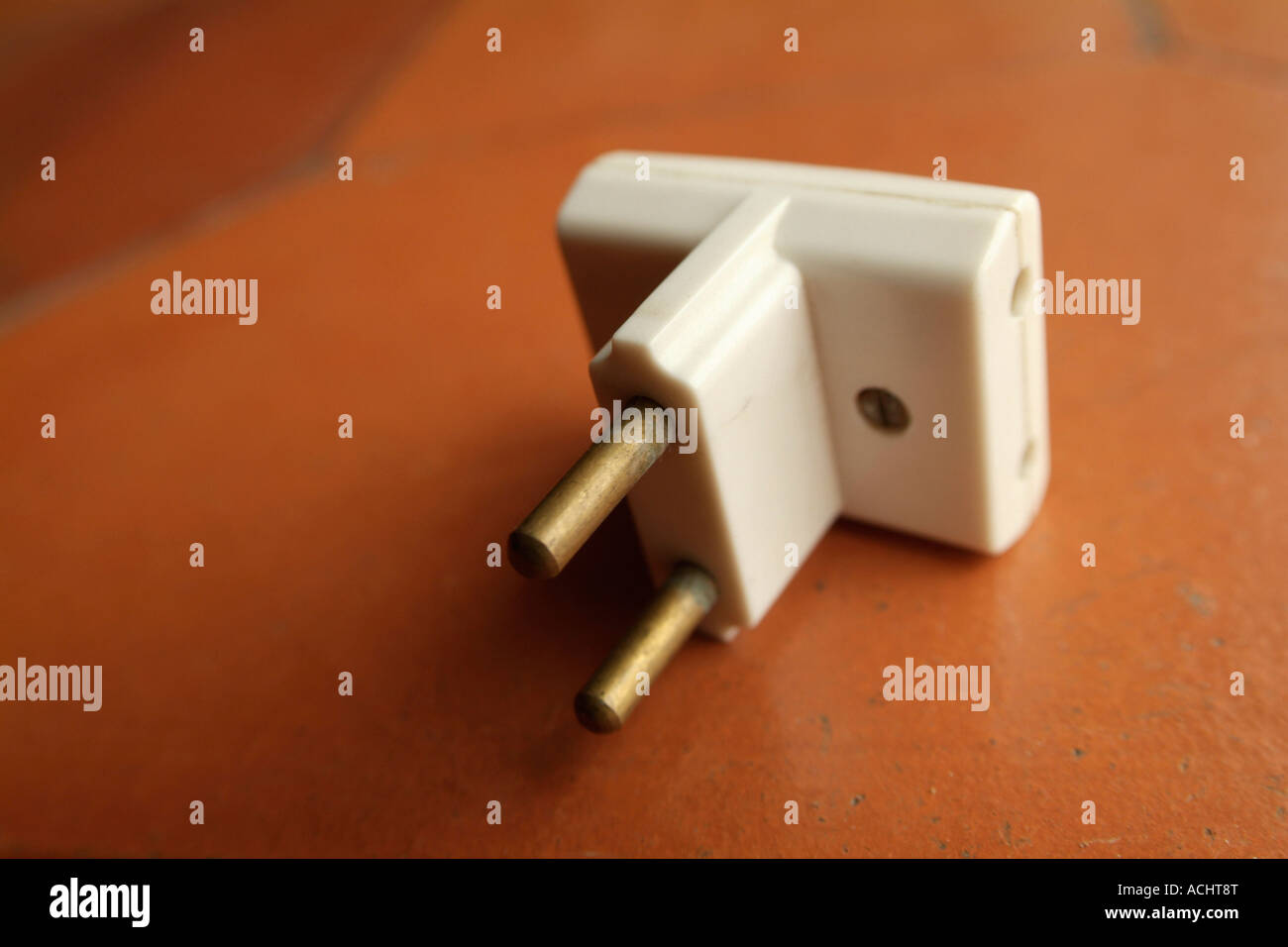 a one-to-three european electric plug Stock Photo - Alamy