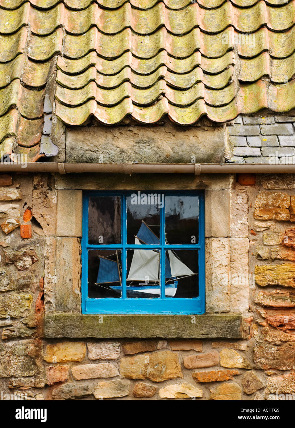 Old cottage window with boat model Stock Photo - Alamy