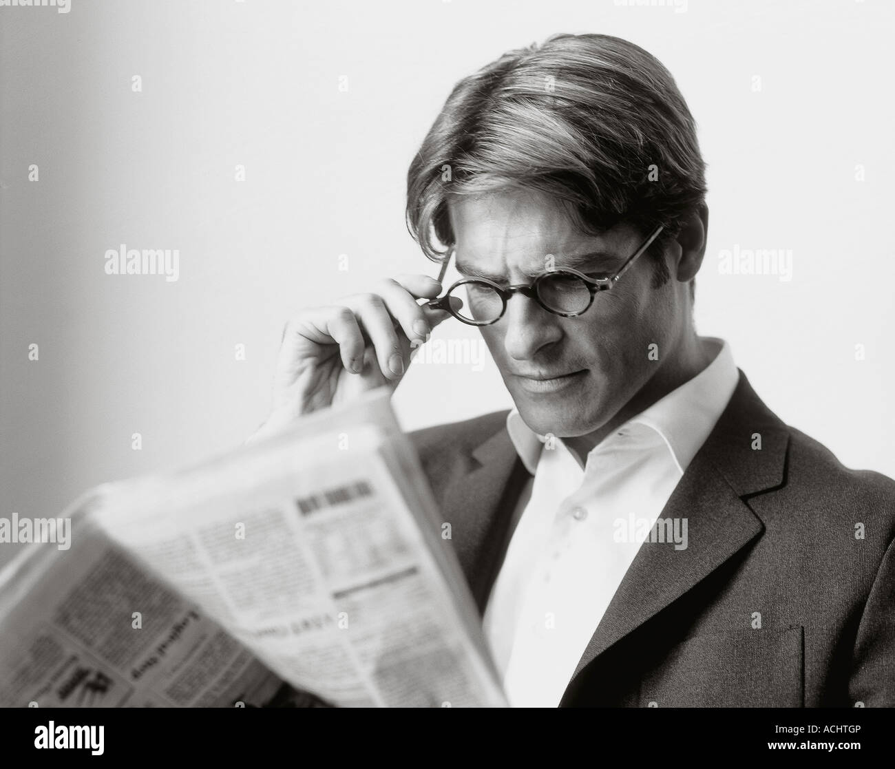 Black and white man reading hi-res stock photography and images - Alamy