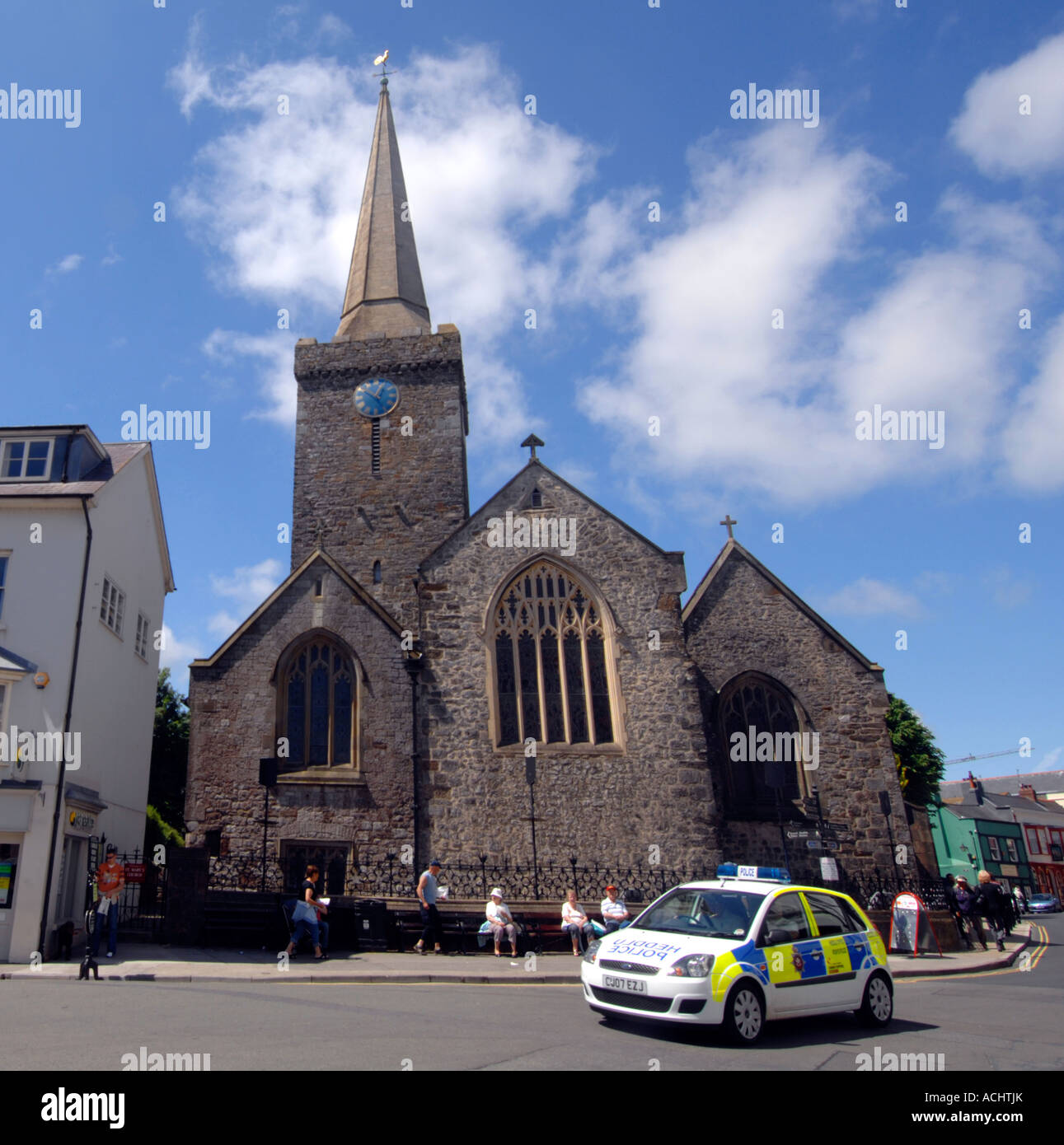 Police passing St Mary's Church, Tenby, Pembrokeshire West Wales, UK ...