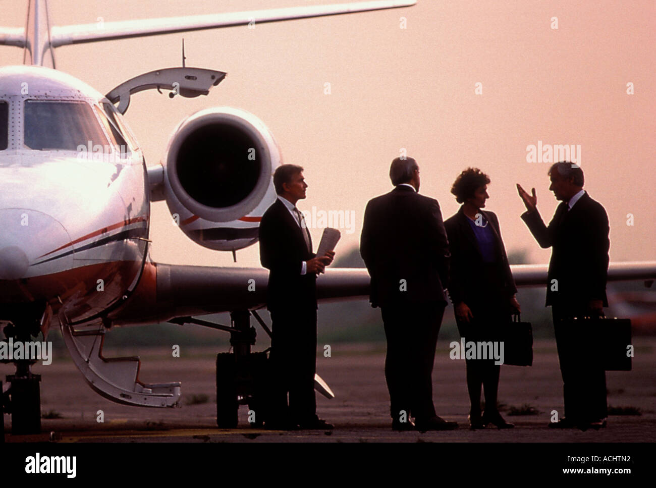Executives Traveling by Private Jet departing airport Stock Photo - Alamy