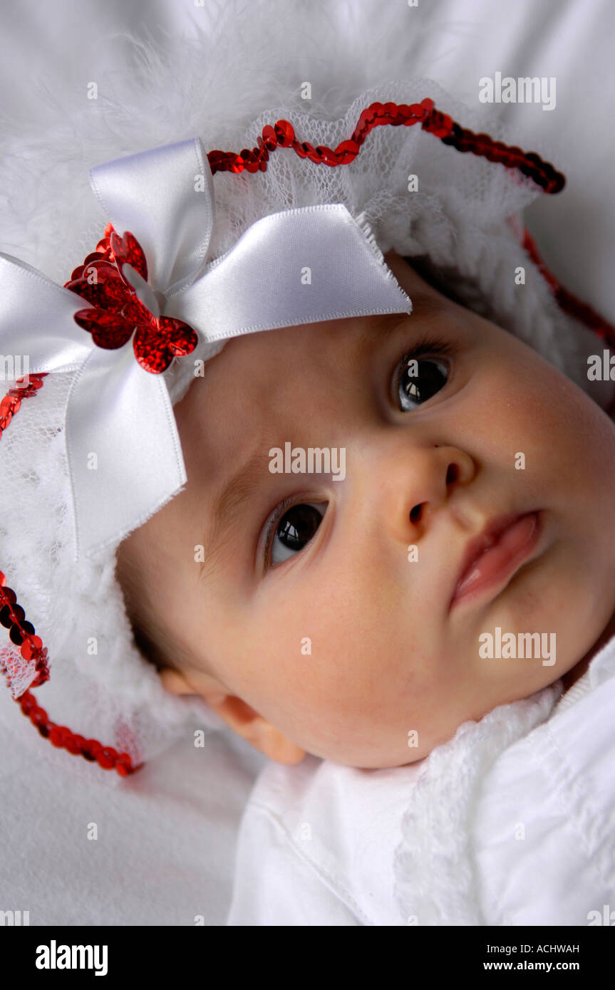 baby bonnet hat white red portrait face child infant colour color cute ...