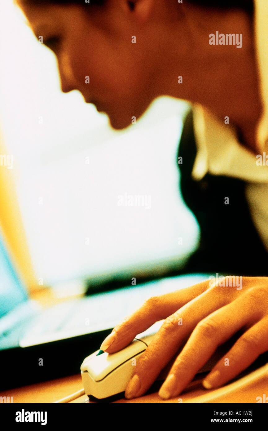 Portrait woman profile holding computer mouse Stock Photo - Alamy