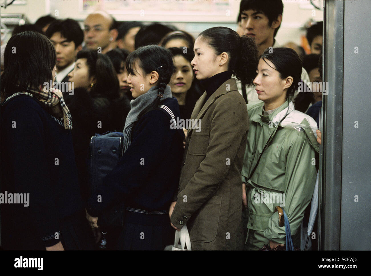 Japan Tokyo Passengers on crowded downtown subway train Stock Photo - Alamy