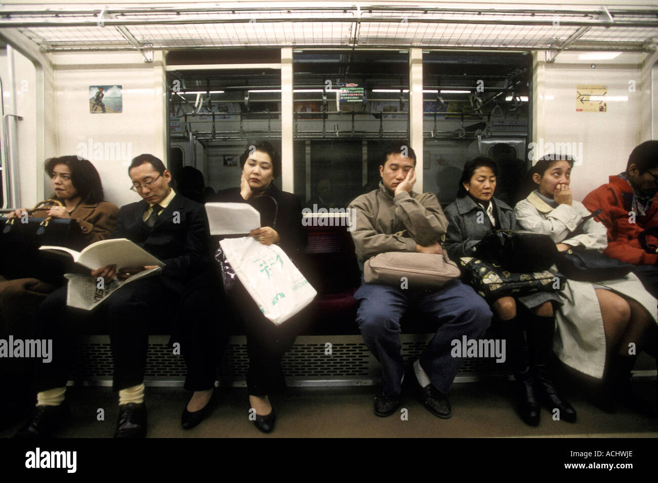 Japan Tokyo Passengers on crowded downtown subway train Stock Photo - Alamy