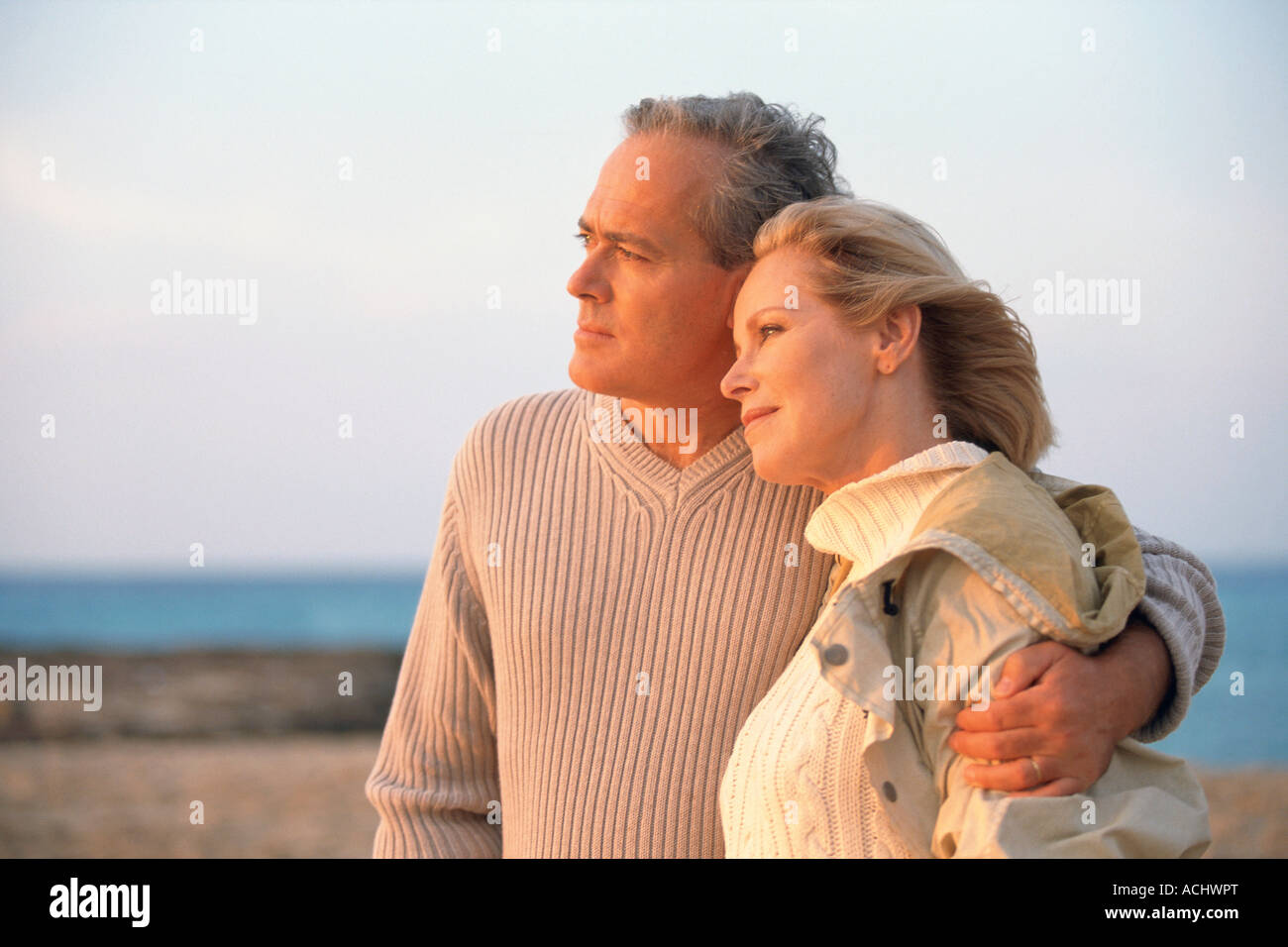 Couple at the seaside profile Stock Photo - Alamy