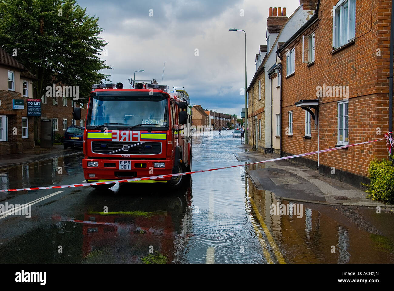 Fire Engine in Flooded Street Stock Photo - Alamy