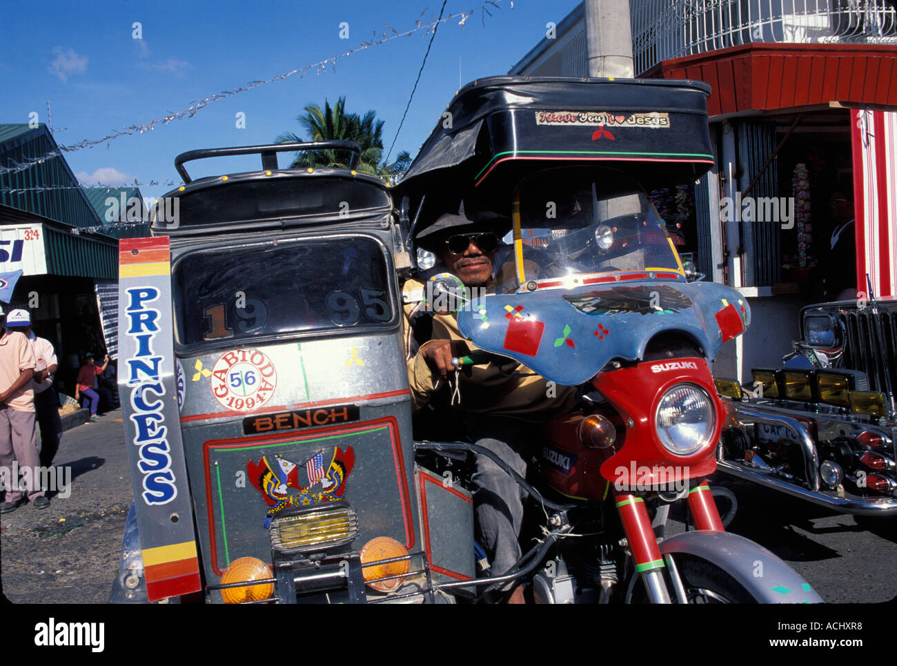 Philippines Brightly painted motorcycle taxi near Gapan in northern ...