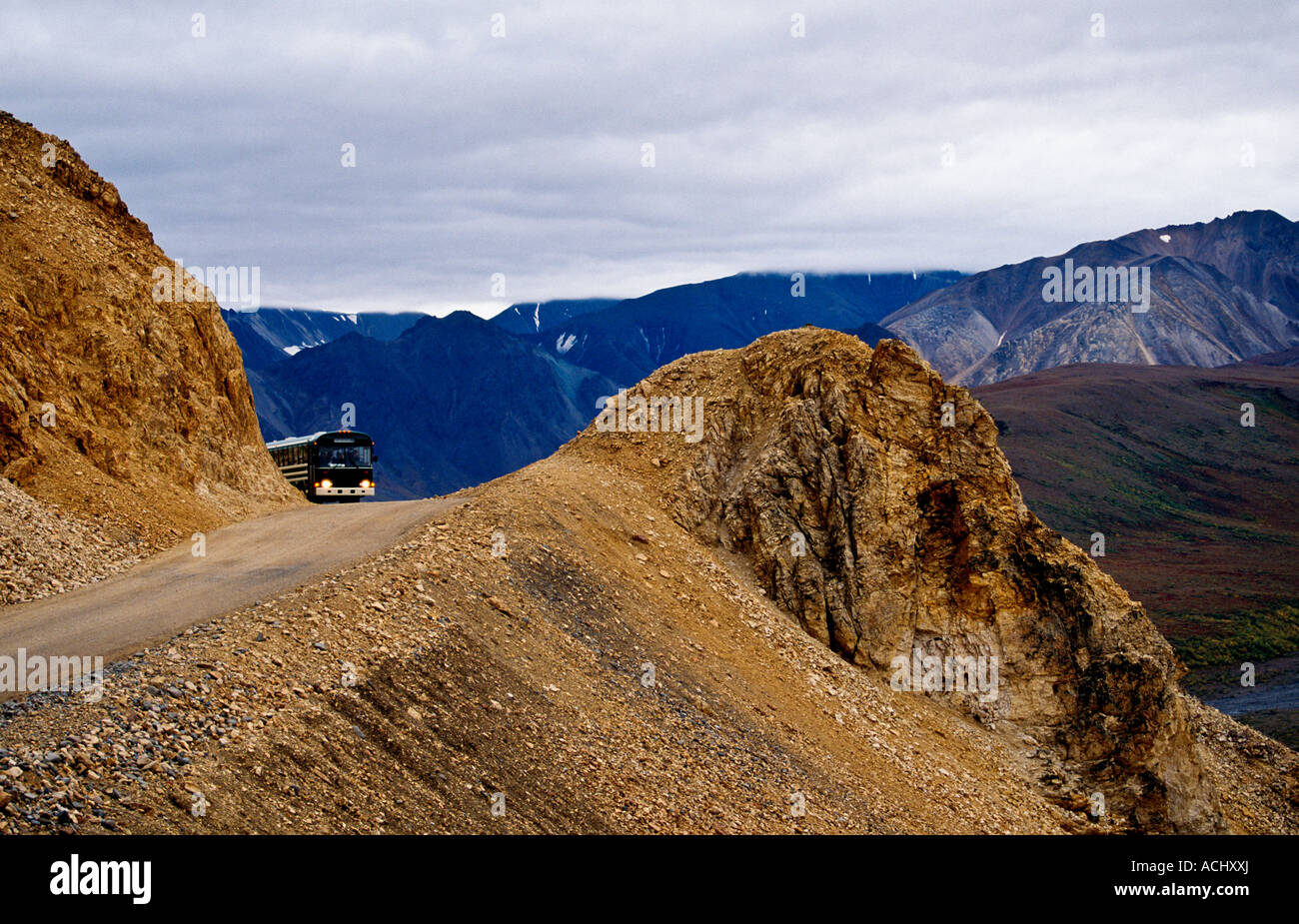 Bus on the mountain road Stock Photo - Alamy