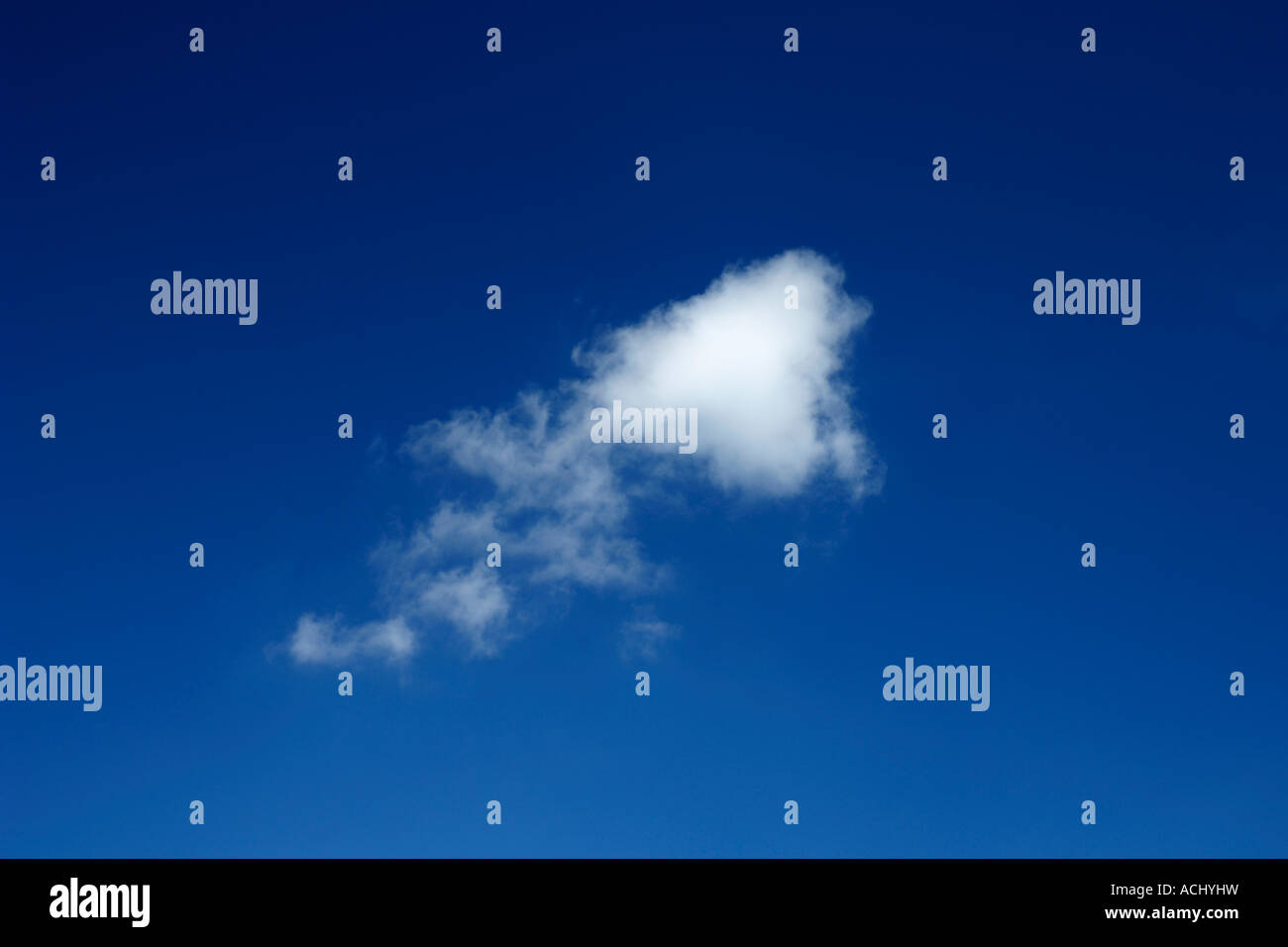 Small cloud in blue sky Stock Photo - Alamy