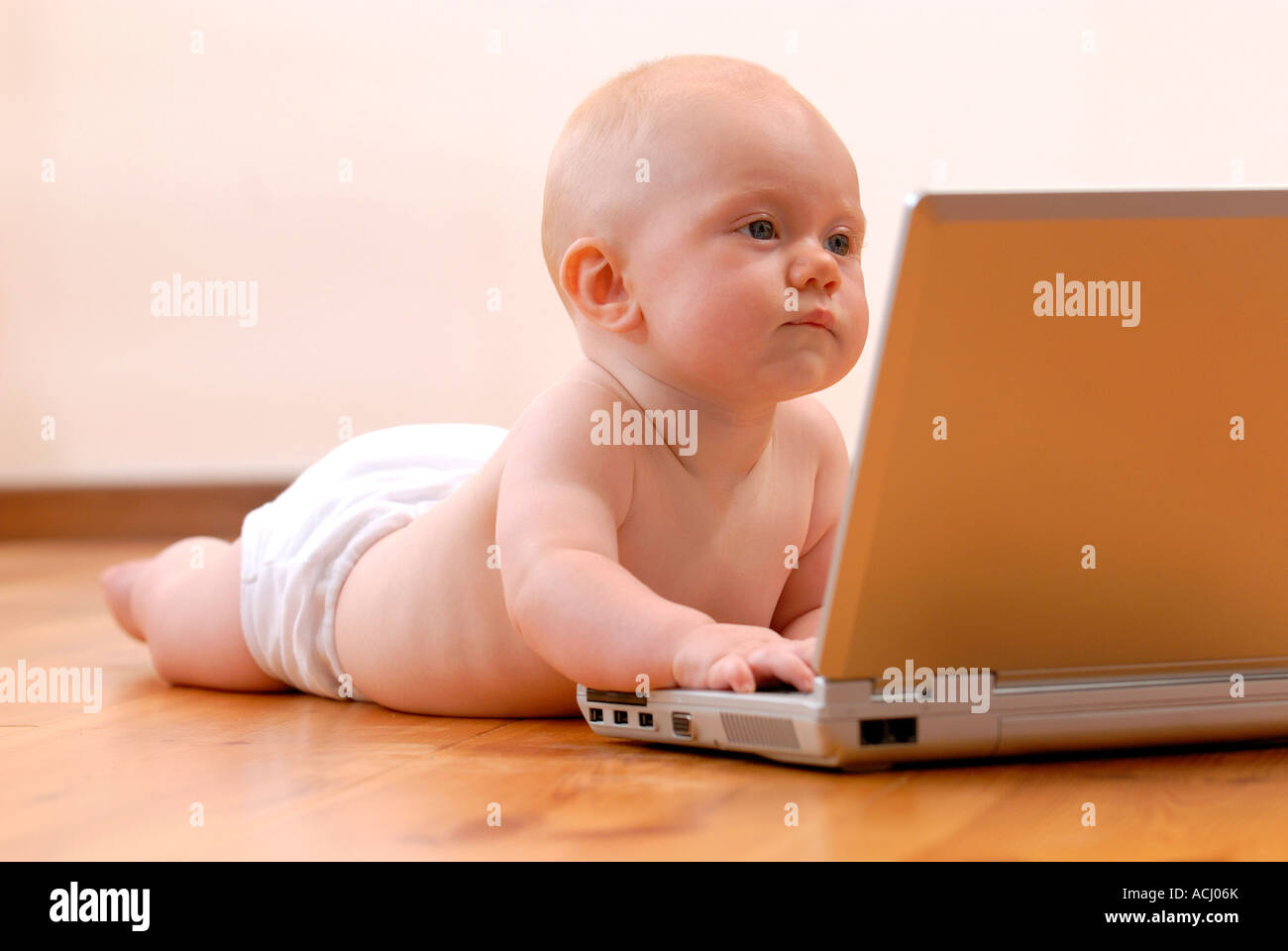 infant baby using laptop computer Stock Photo - Alamy
