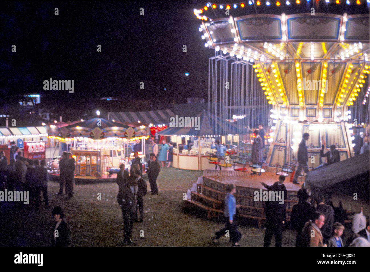 Traditional English Fairground at night on Ealing Common West London ...