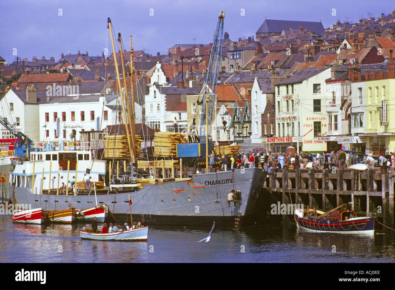 England North Yorkshire Whitby Harbour River Esk MV Charlotte unloading ...