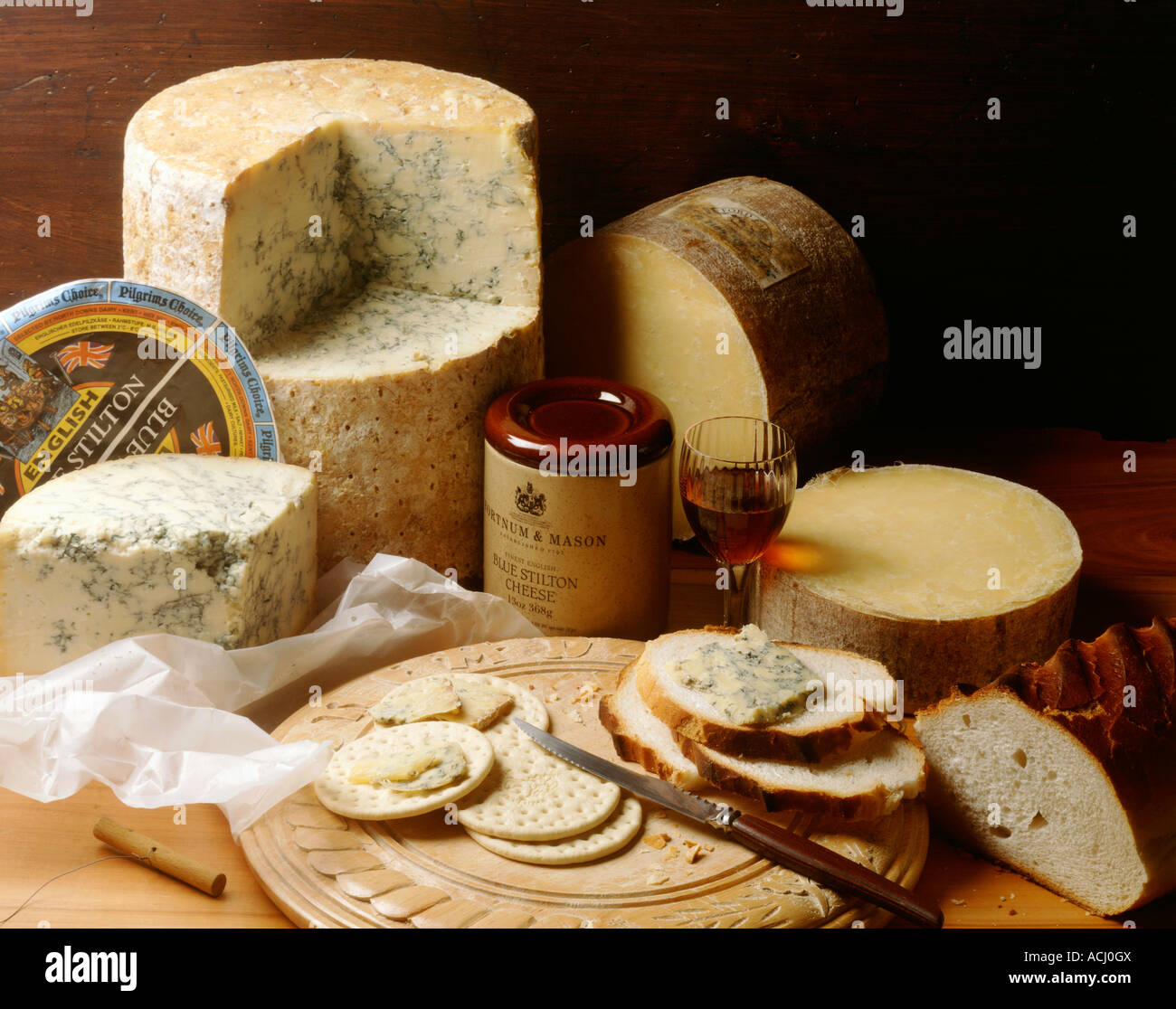 England composition cheese: stilton cheddar on bread in plate wine ...