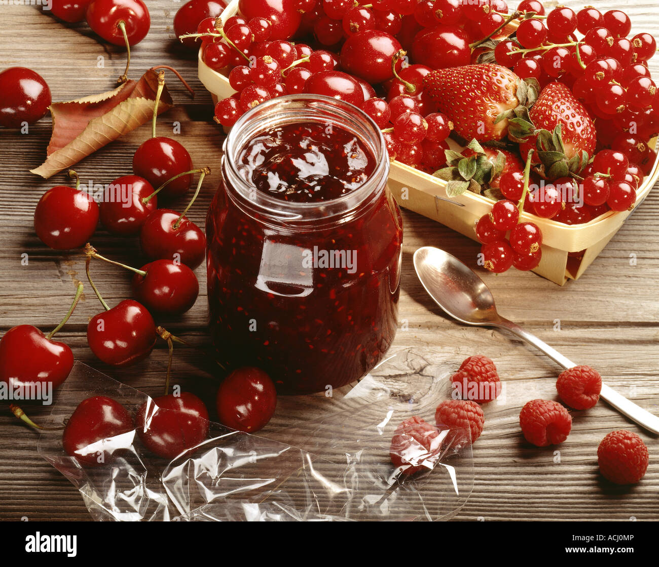 Red fruit jam pot basket cherries gooseberry strawberry Stock Photo - Alamy
