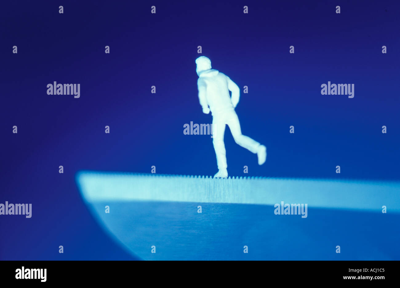 Man running on blade knife hi-res stock photography and images - Alamy
