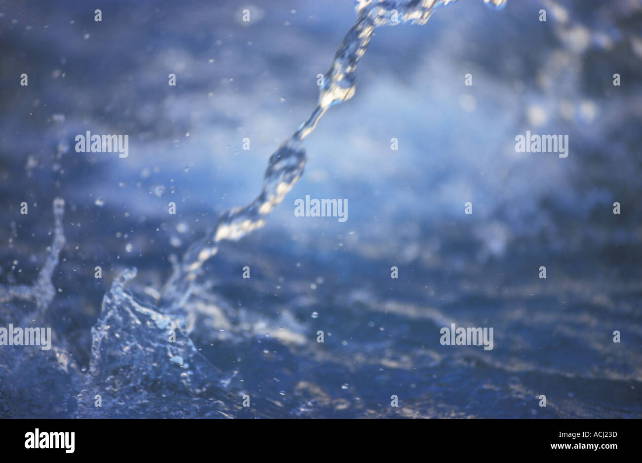 Jet of water out of focus Stock Photo - Alamy
