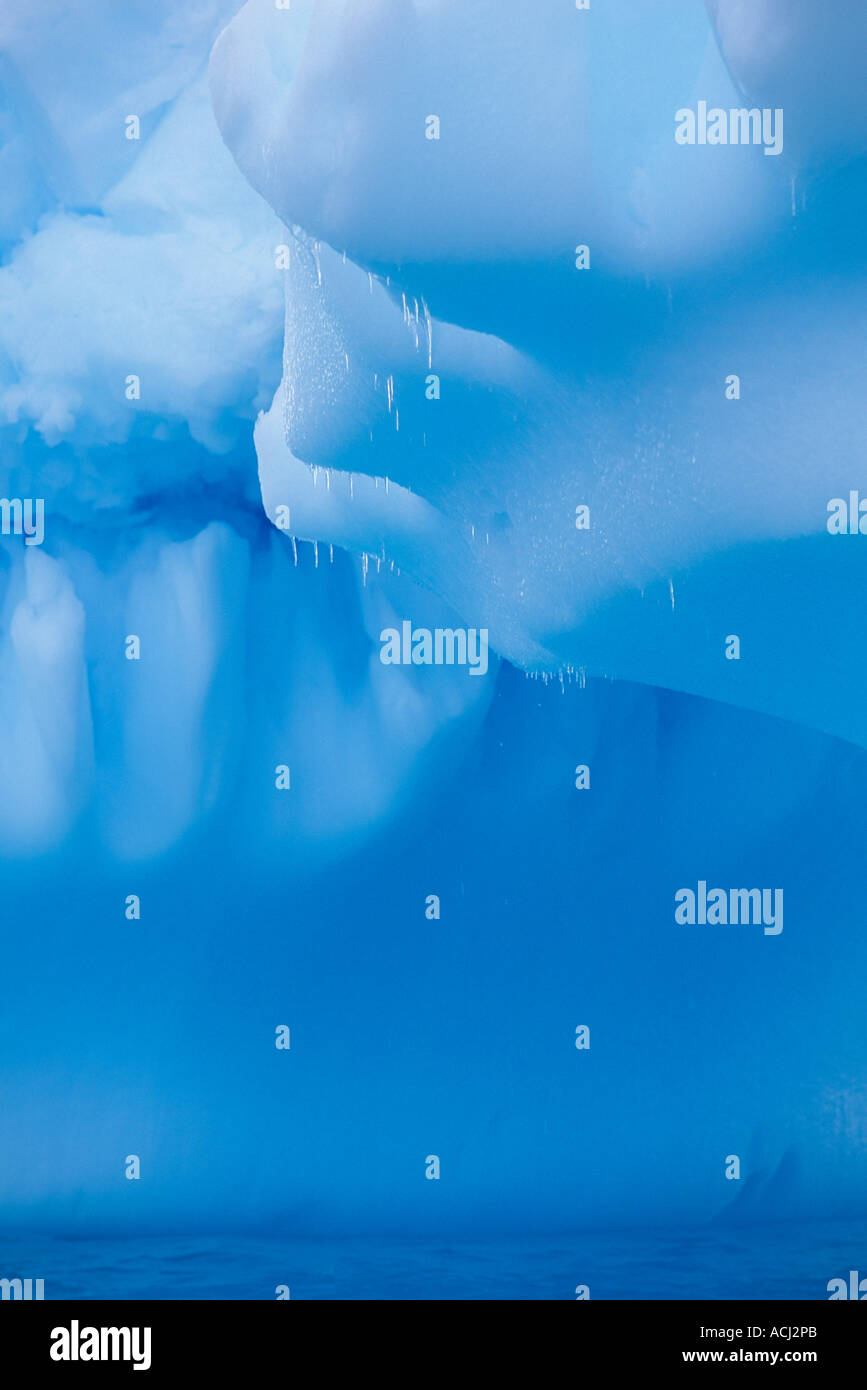 Antarctica Petermann Island Deep blue iceberg floating in Argentine ...