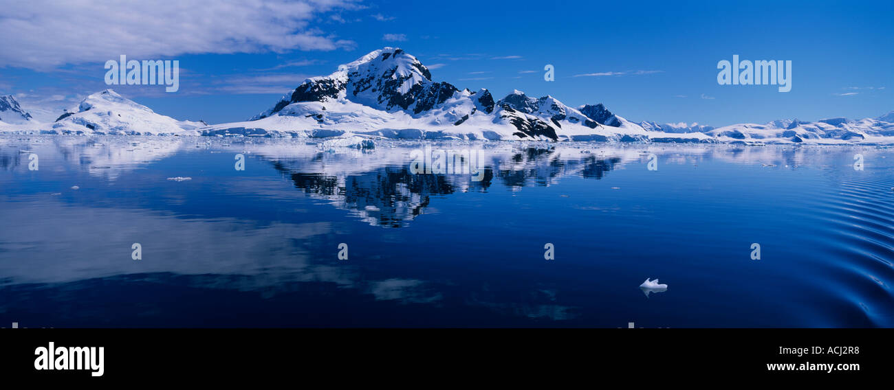 Antarctica Paradise Bay Glacier covered peaks on Bryde Island reflected ...
