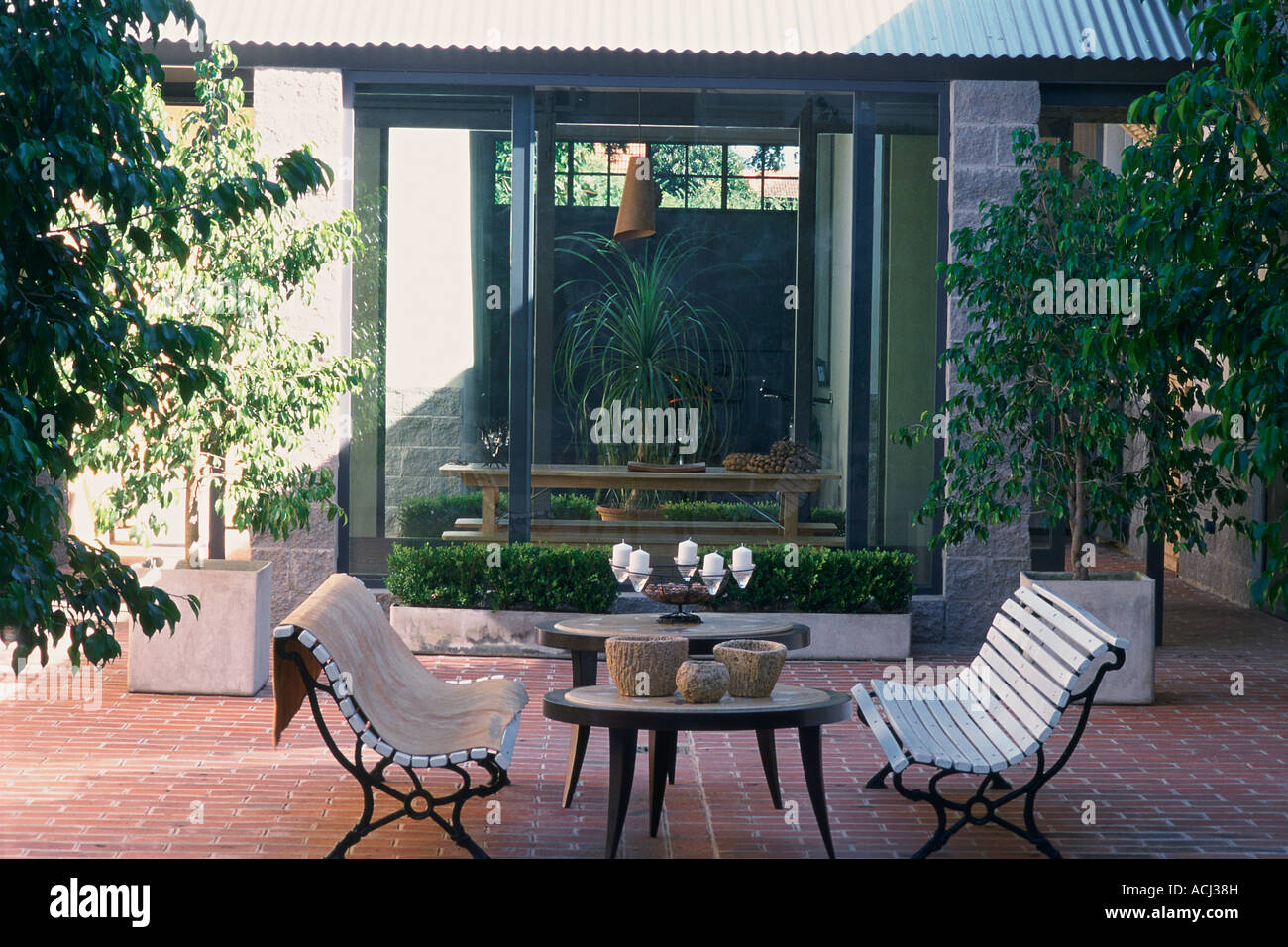 Terrace benches and tables bay-window plants Stock Photo - Alamy