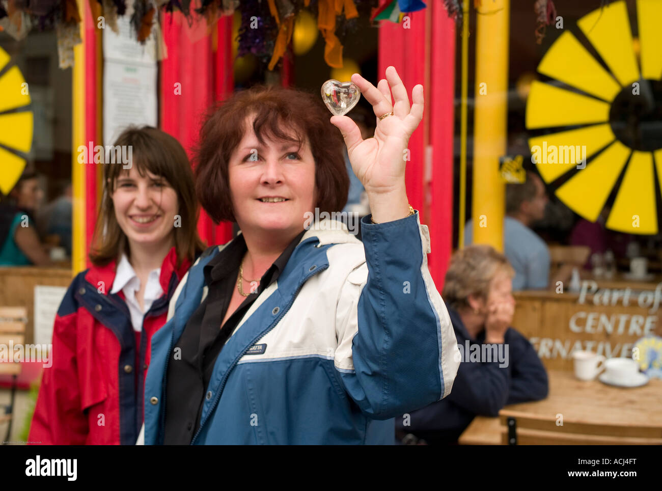 Woman with heart shaped crystal Street Market Machynlleth Powys Mid ...
