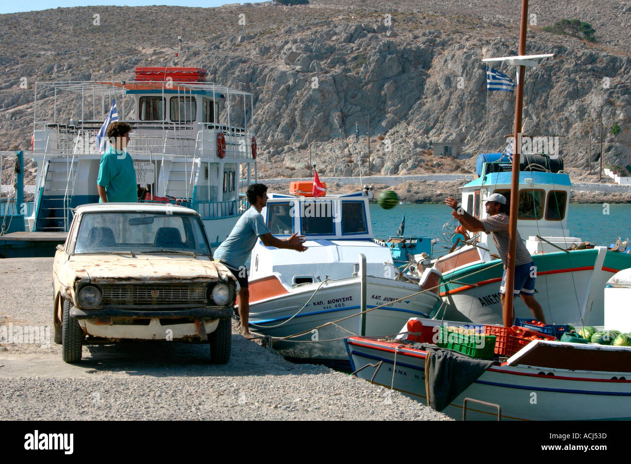 Unloading water melons, Greek Island, Pserimos Stock Photo - Alamy