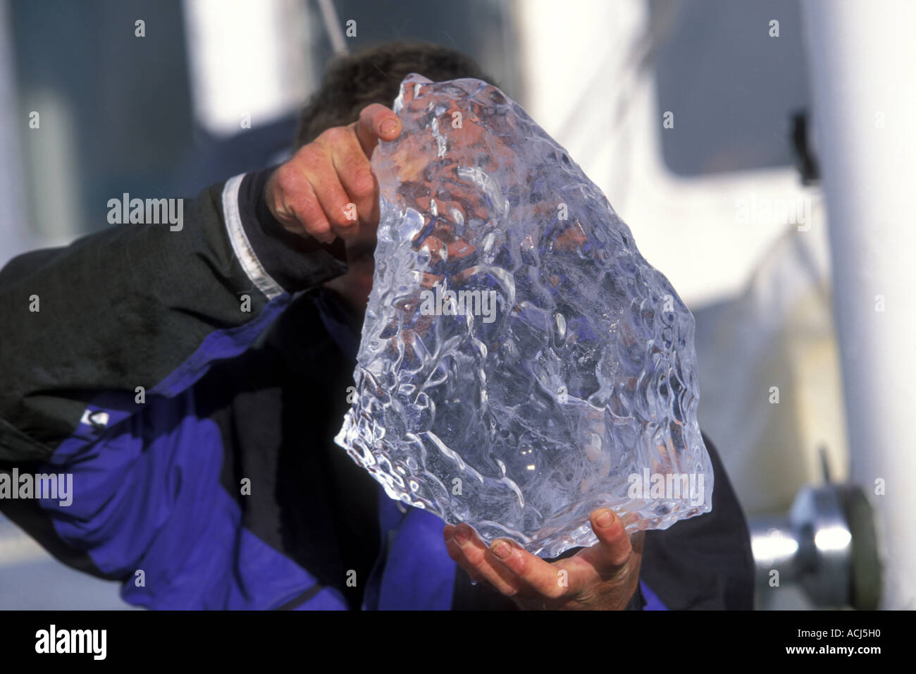 South Georgia Island Peter Nightingale admires small iceberg from ...