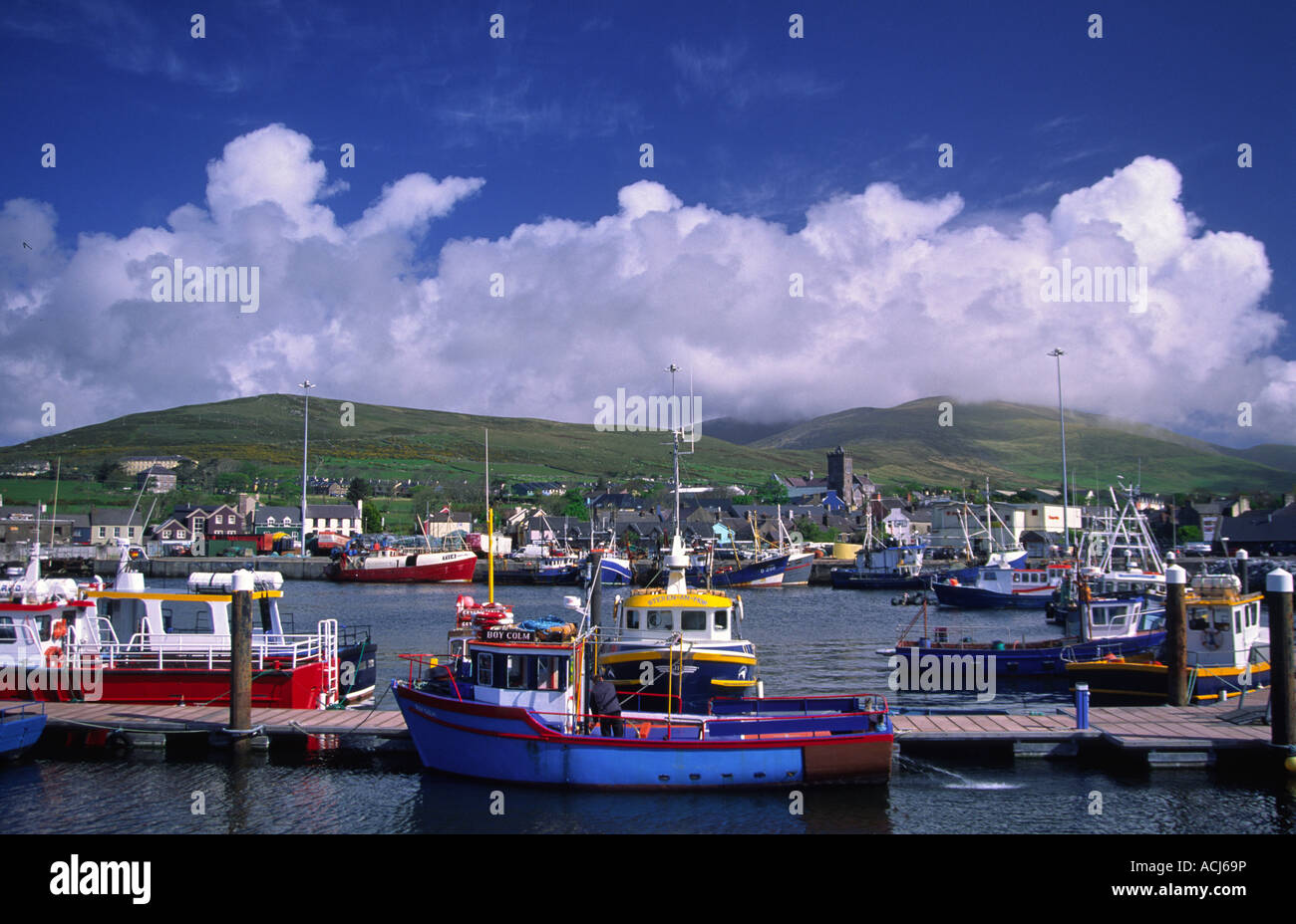 Fishing boats and trawlers moored in in Dingle Harbour. County Kerry ...