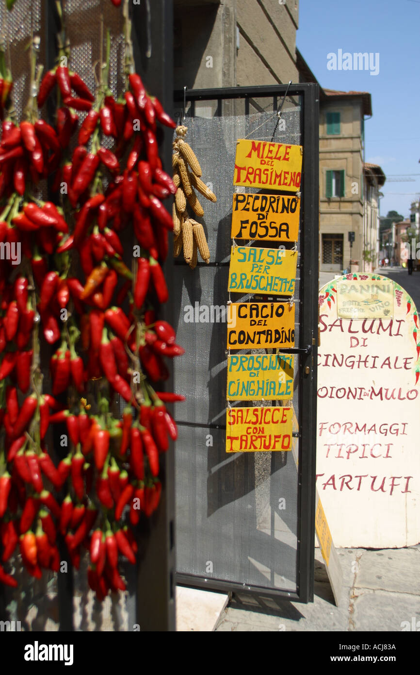 Italian shop sign selling chilli and wild boar Umbria Italy Stock Photo ...