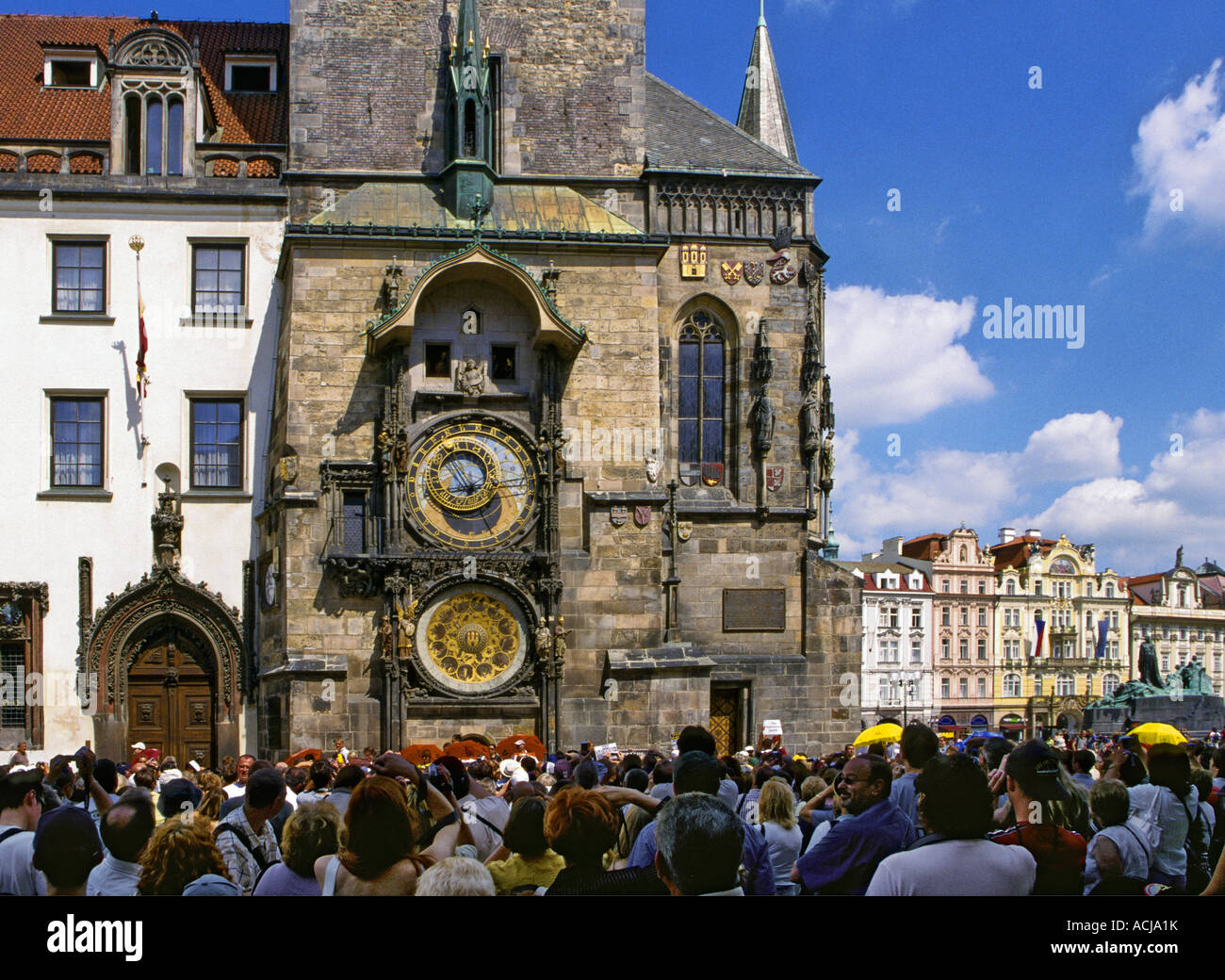 Crowd of tourists watching Astronomical Clock at Old Town Square in ...