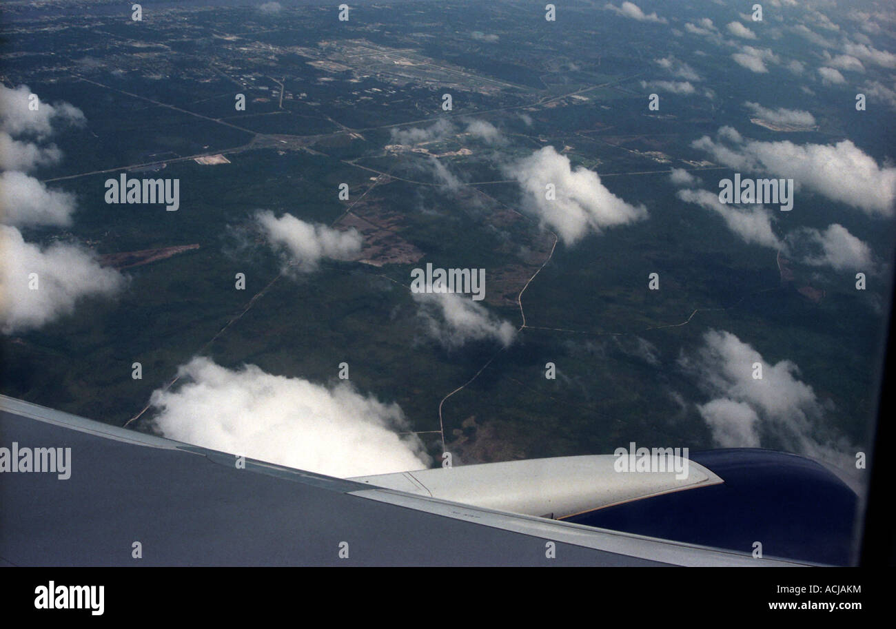 View from an aeroplane window overlooking the wing and jet engine Stock ...
