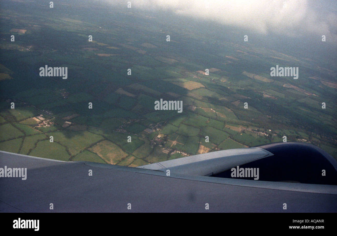 View from an aeroplane window overlooking the wing and jet engine Stock ...