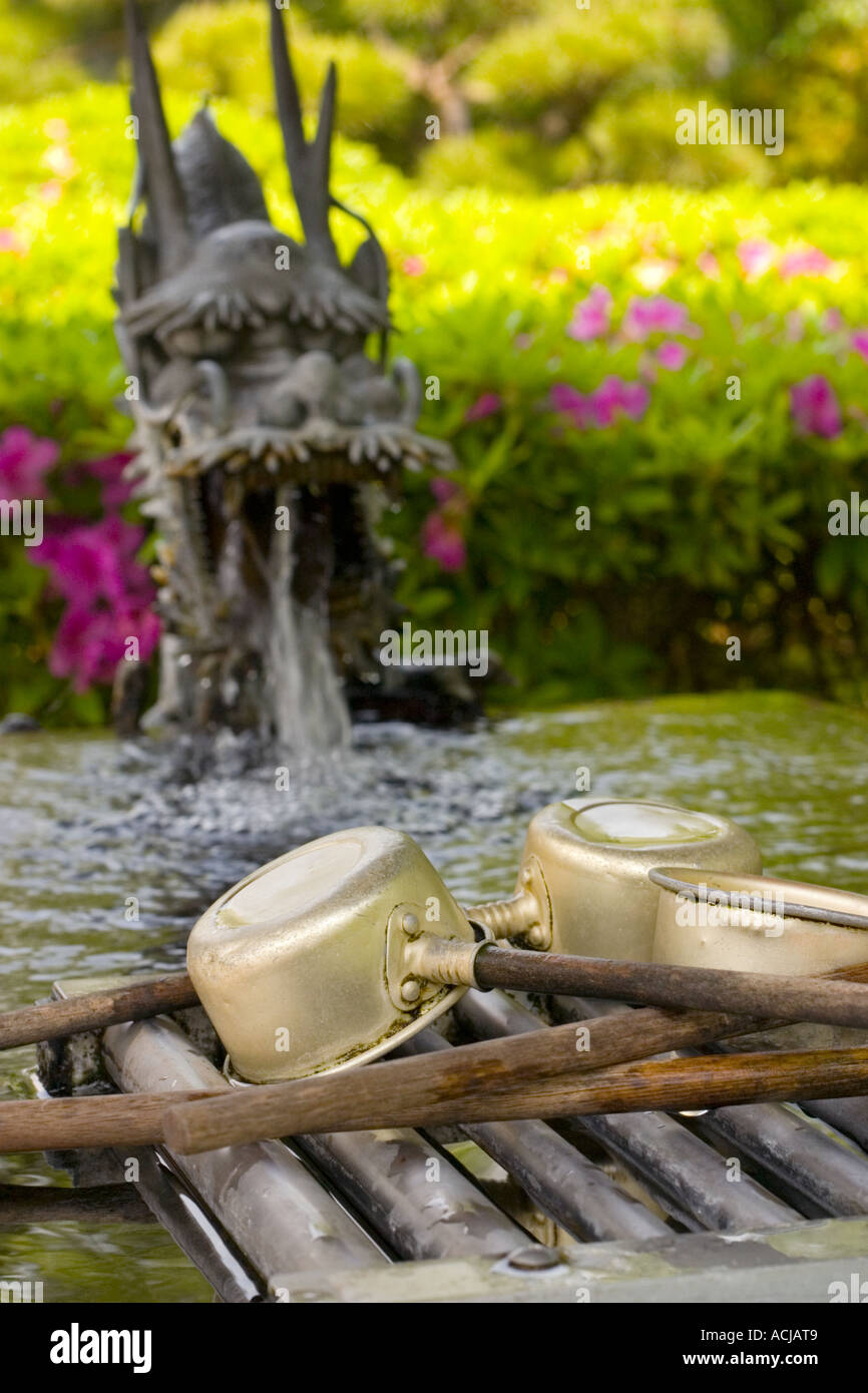 A dragon shaped water fountain at a Shinto shrine Stock Photo - Alamy