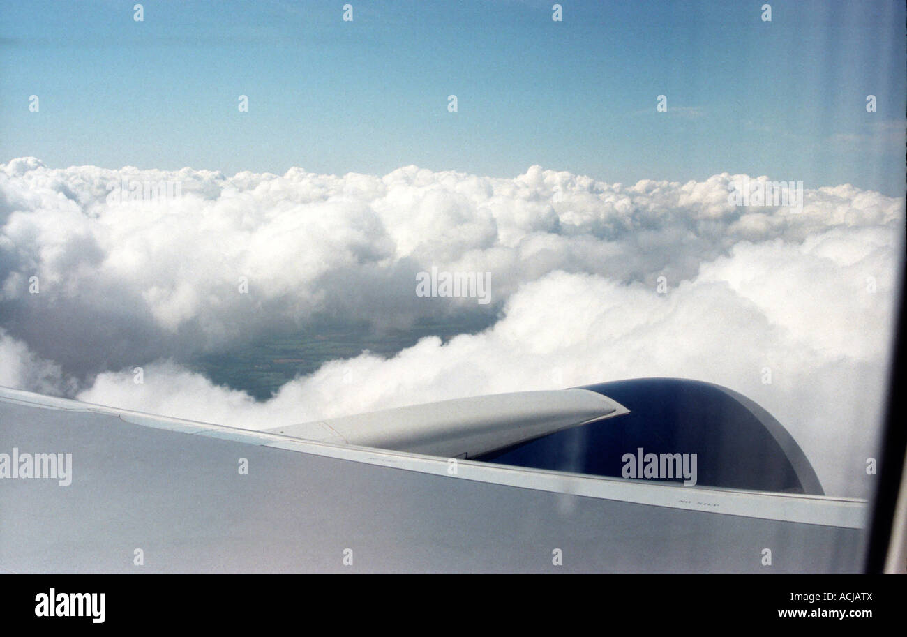 View from an aeroplane window overlooking the wing and jet engine Stock ...