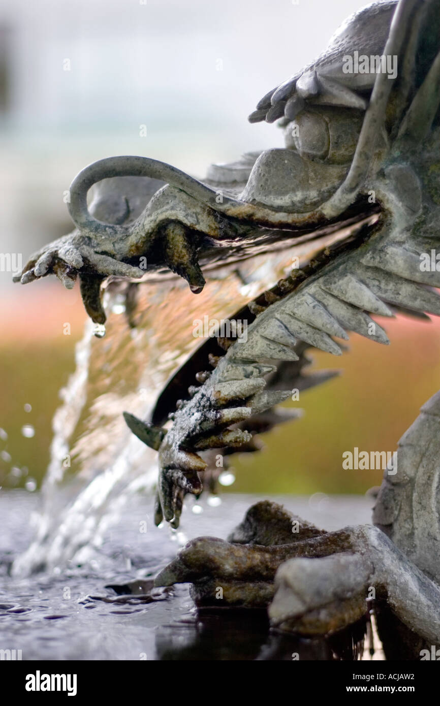 A dragon shaped water fountain at a Shinto shrine Stock Photo - Alamy