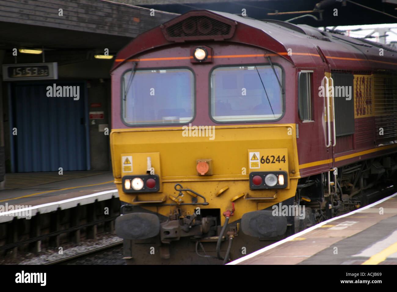 Freight train moving through station hi-res stock photography and ...