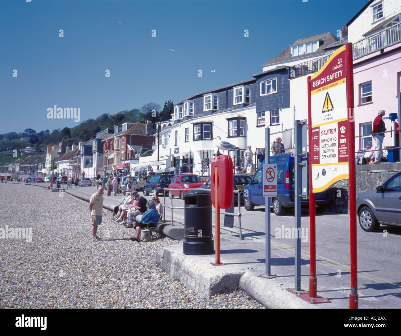 Safety signs and life belt on the promenade, Lyme Regis, Dorset ...