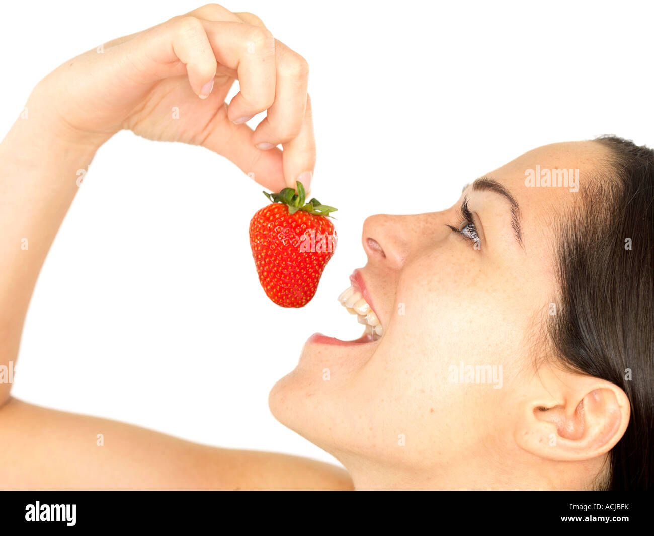 Young Woman Eating Strawberry Model Released Stock Photo - Alamy