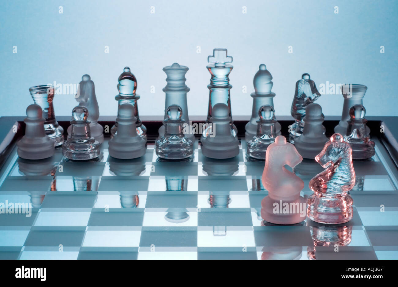 Two chess knights facing off Stock Photo - Alamy