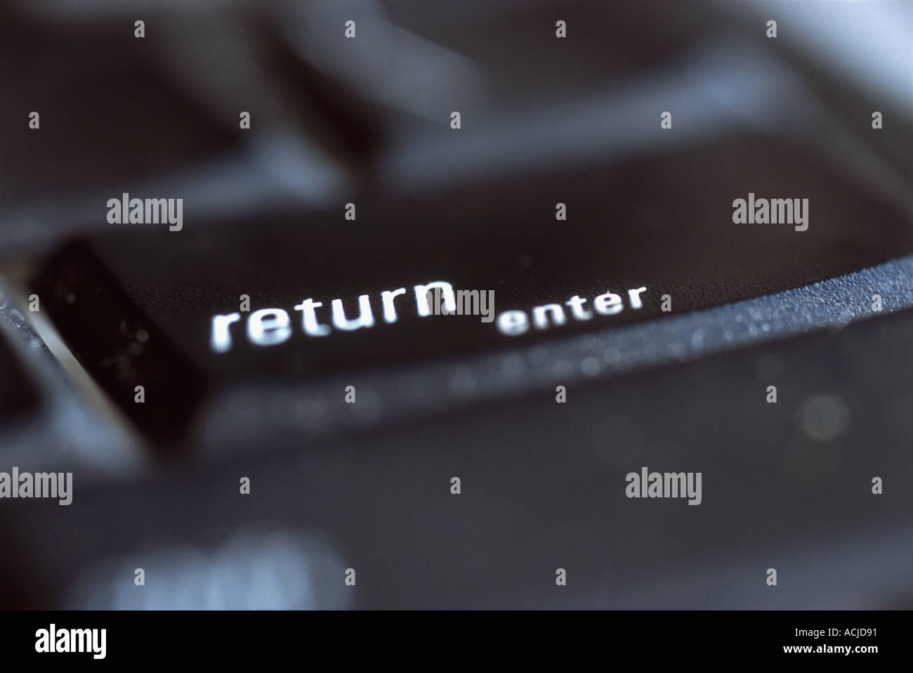 A return enter key on a computer keyboard Stock Photo - Alamy