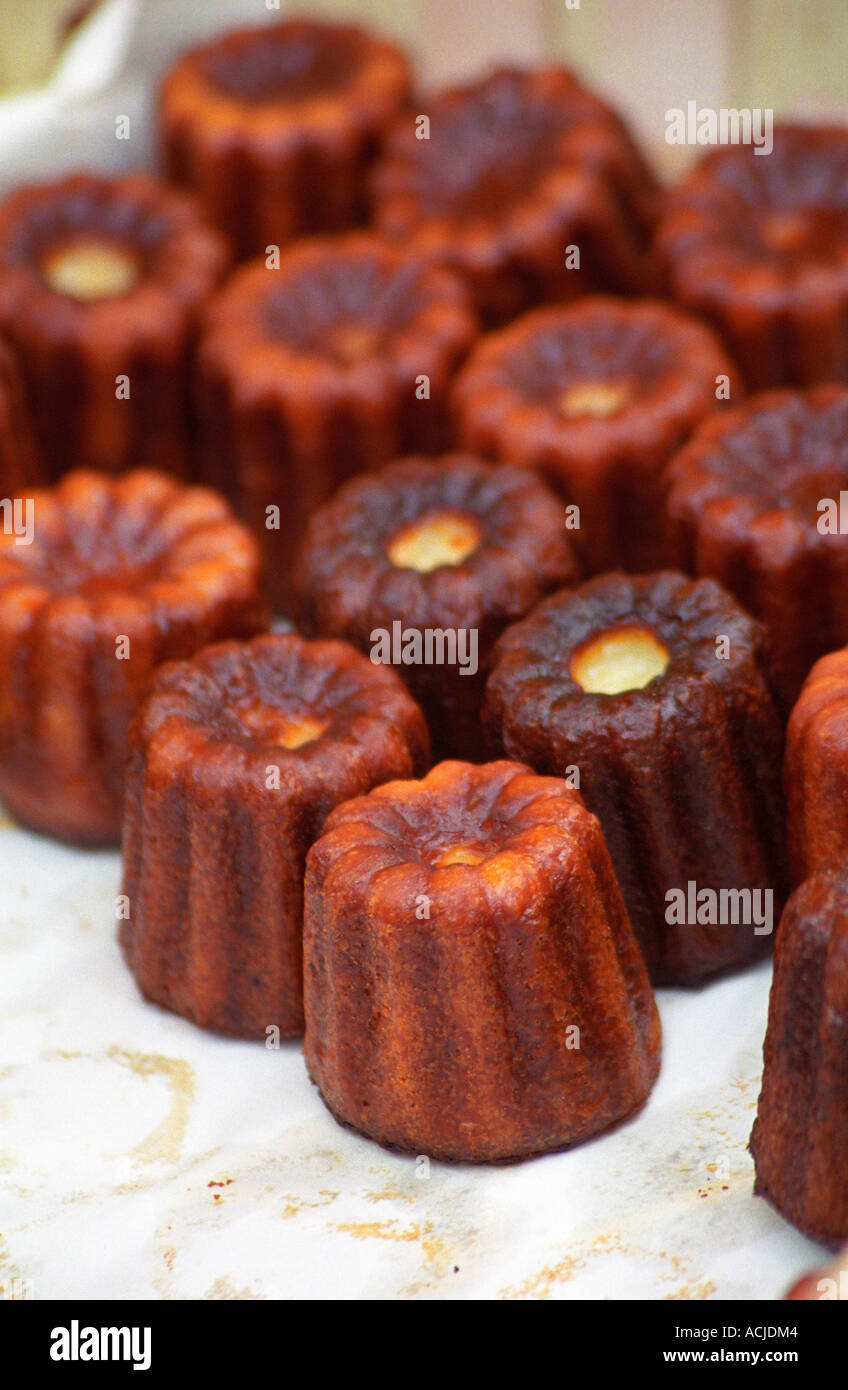 In a street food market in Bordeaux on the Quai des Chartrons: Canelés ...