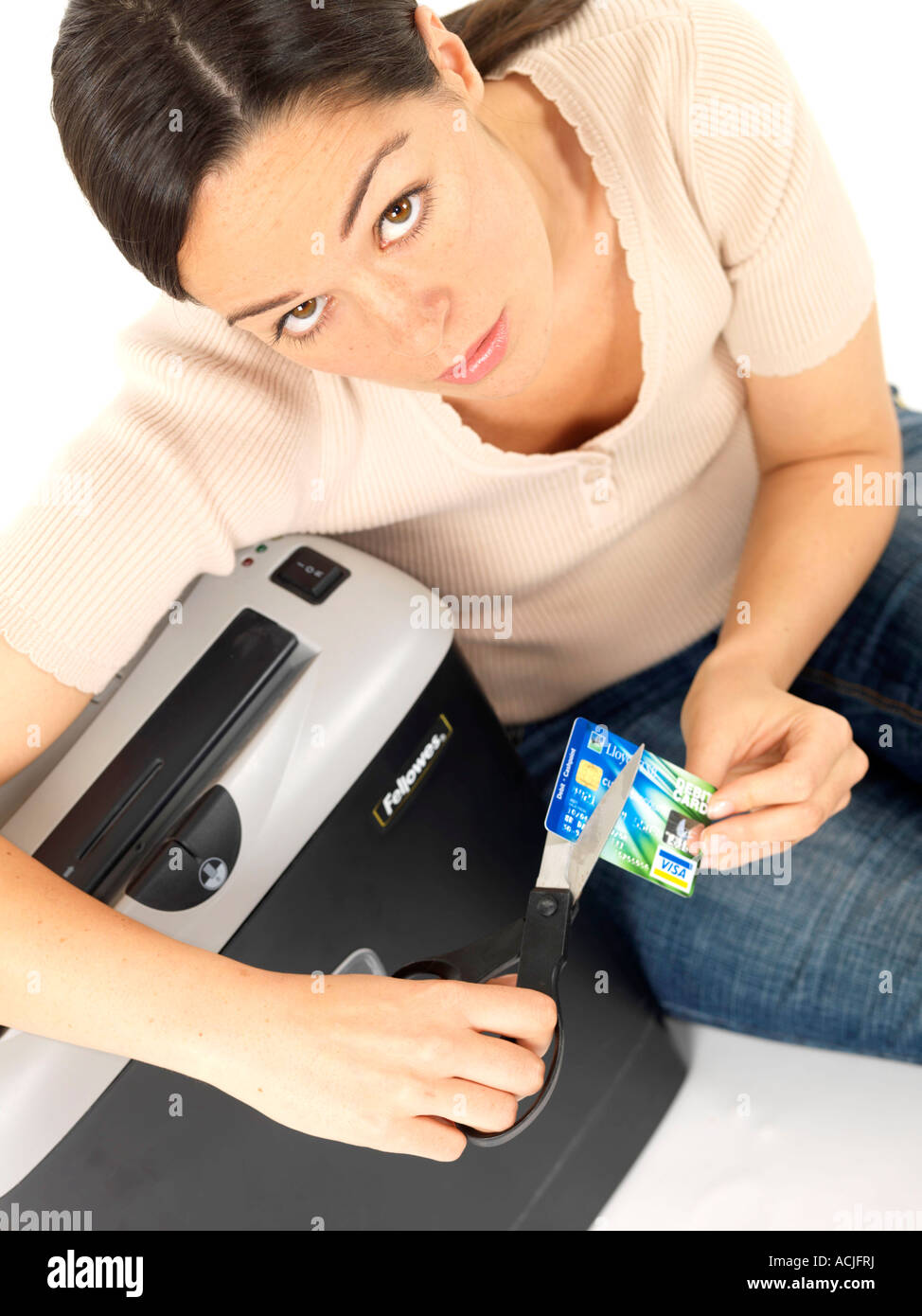 Young Woman Cutting Credit Card Model Released Stock Photo - Alamy