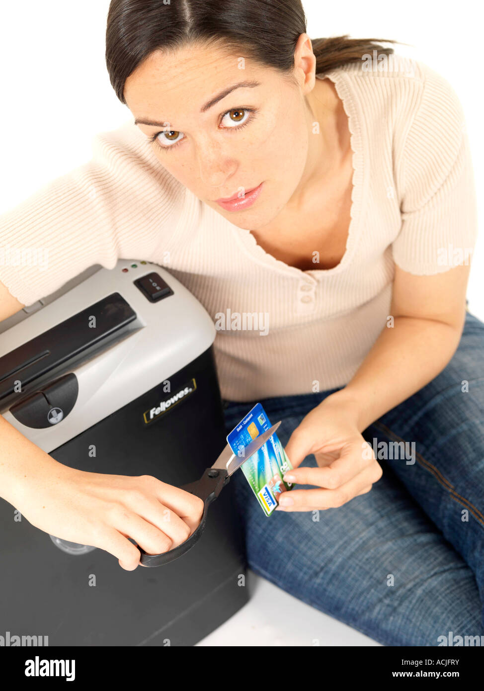Young Woman Cutting Credit Card Model Released Stock Photo - Alamy