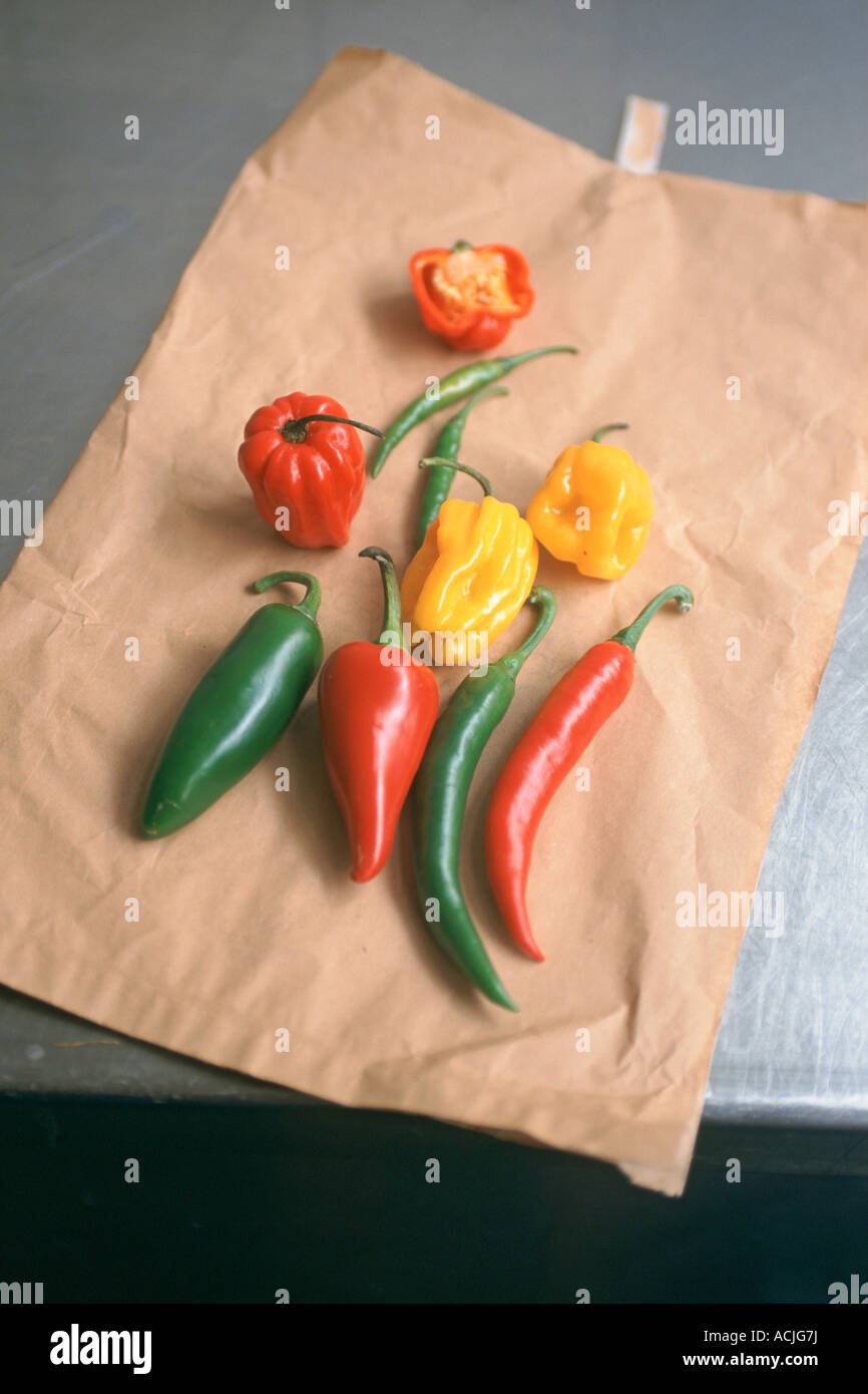 10 peppers with different forms: red green yellow in kraft paper Stock ...