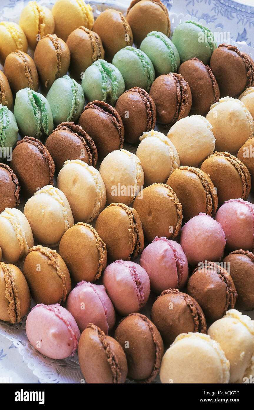 Composition different sorts of macaroons aligned in plate Stock Photo ...