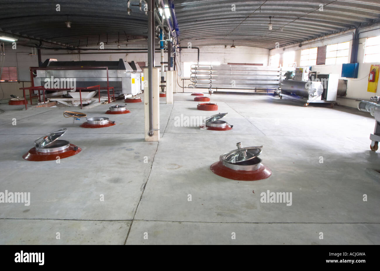 The winery, on top of the concrete fermentation tanks and the wine ...